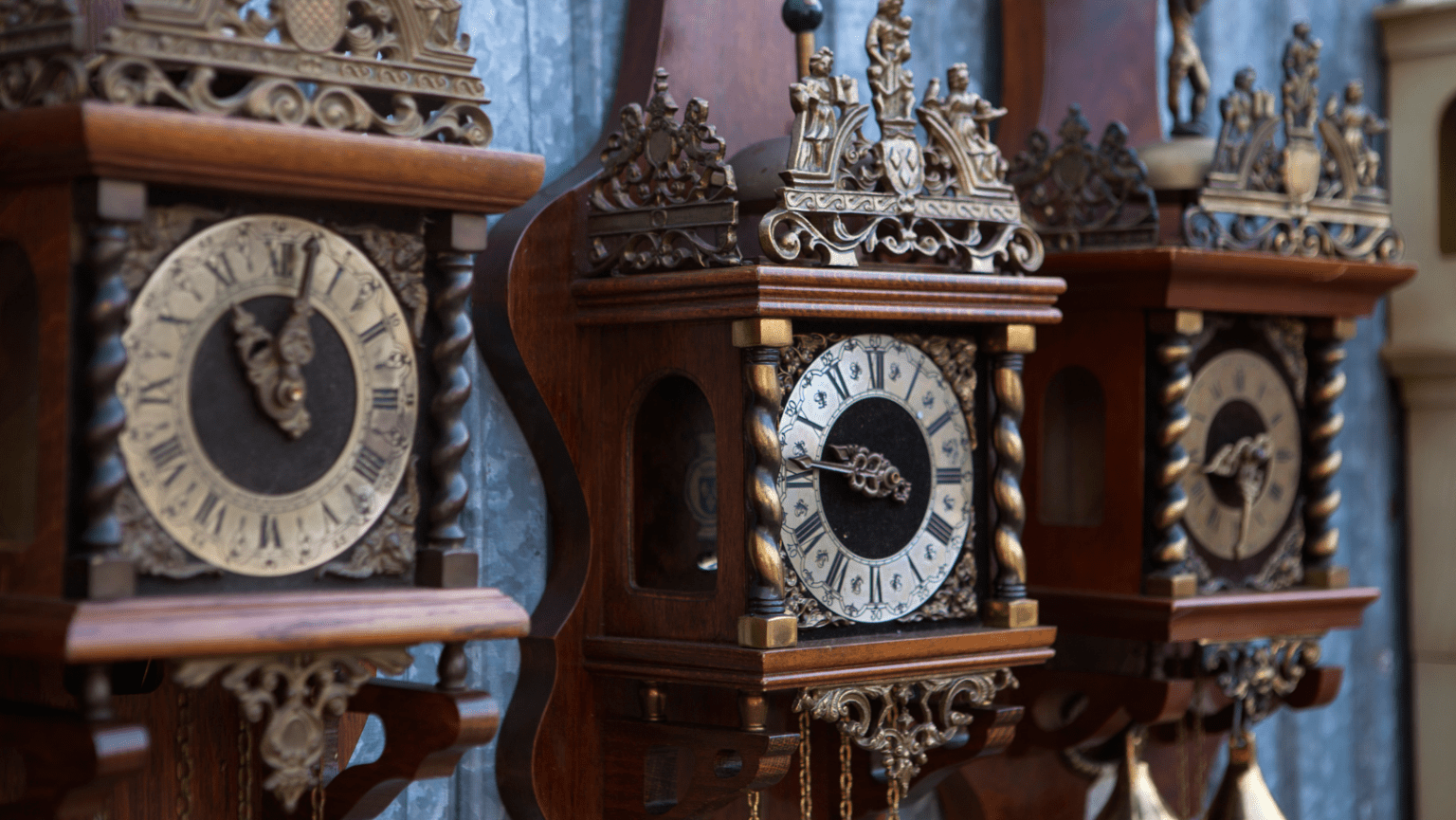 WHY DO THEY CALL GRANDFATHER CLOCKS BY THAT NAME?